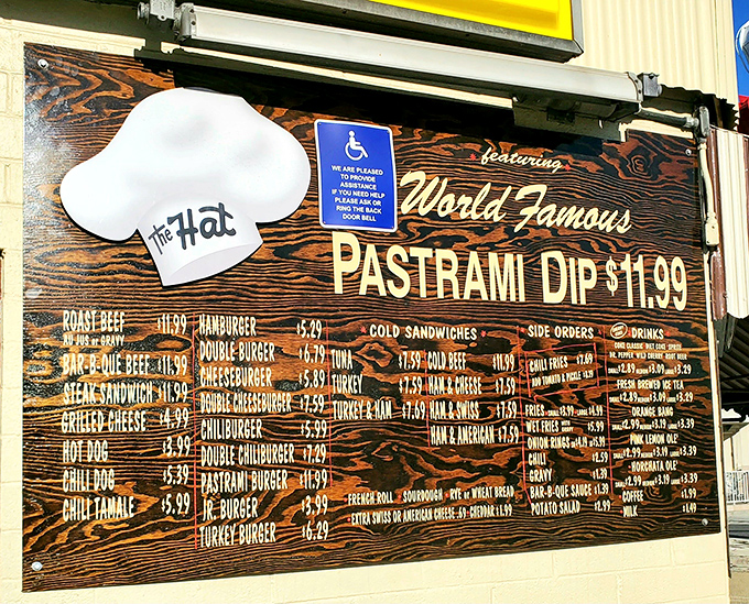 The menu board at The Hat is like a roadmap to comfort food nirvana, with that famous pastrami dip front and center.