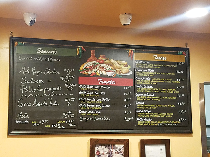 The menu board tells stories of culinary tradition with each chalk-written offering. Decisions have never been so deliciously difficult.