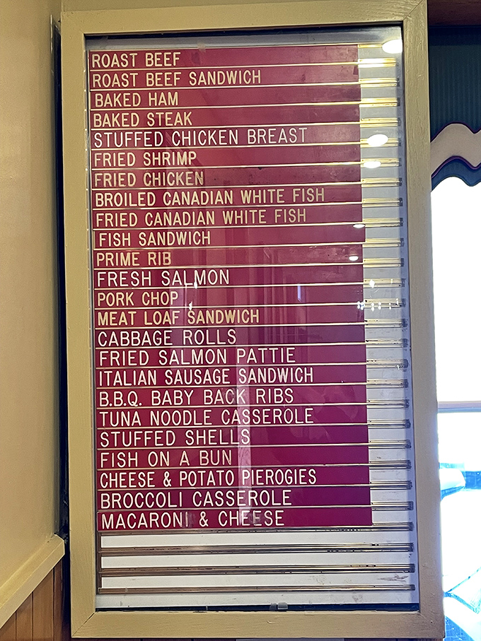 This menu board isn't just a list &ndash; it's a roadmap to happiness. No fancy fonts or pretentious descriptions, just straightforward promises of deliciousness.