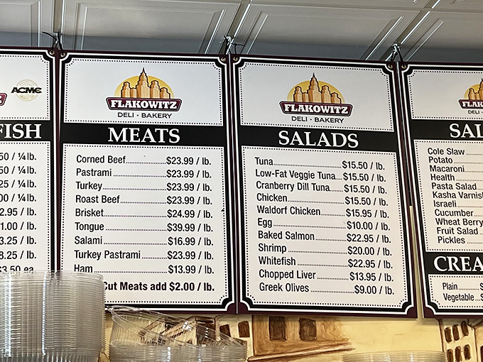 The menu board at Flakowitz reads like a love letter to Jewish deli classics. Each item represents generations of perfected recipes.