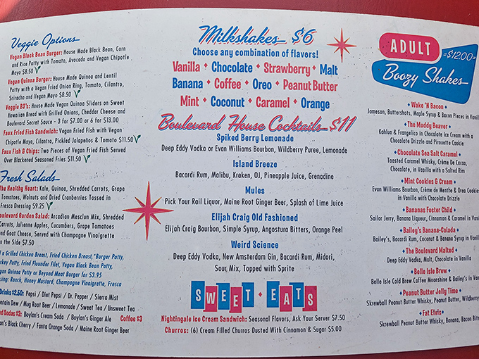 A menu that doesn't need fancy fonts to impress. When milkshakes come in fifteen flavors and cocktails sport names like "Weird Science," you know you're in for a treat.