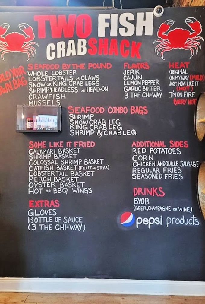 The menu board reads like seafood poetry: snow crab, king crab, and "3 The Chi-Way" seasoning that'll make your taste buds dance the Chicago shuffle.
