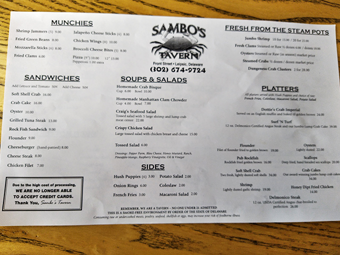 This unassuming menu holds the key to seafood nirvana. The "Homemade Crab Bisque" entry is your treasure map to bliss.