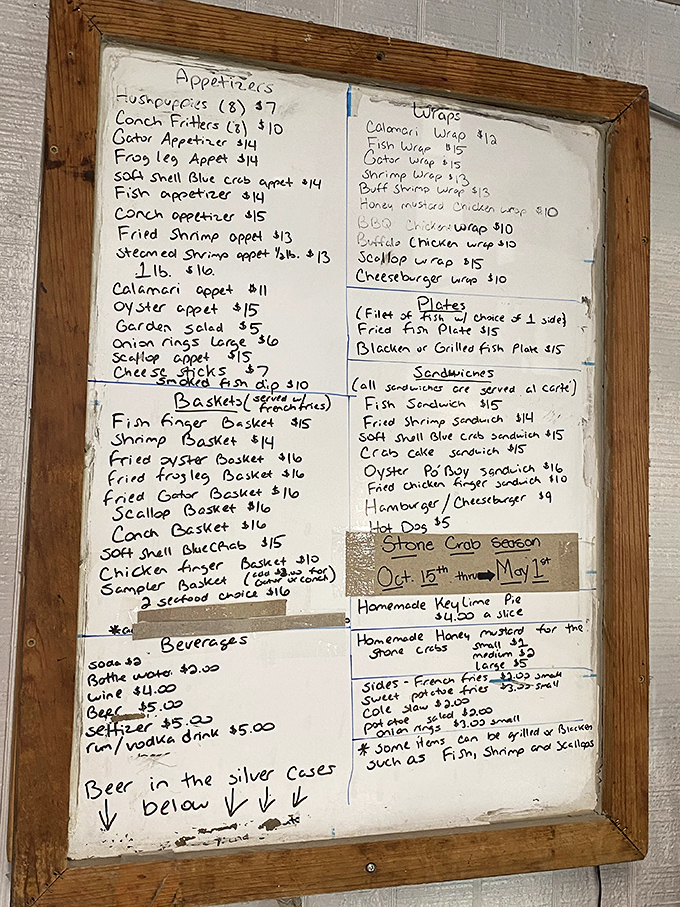 The handwritten menu board&mdash;culinary scripture for seafood lovers. When menus look like this, you know you're not in chain restaurant territory anymore.