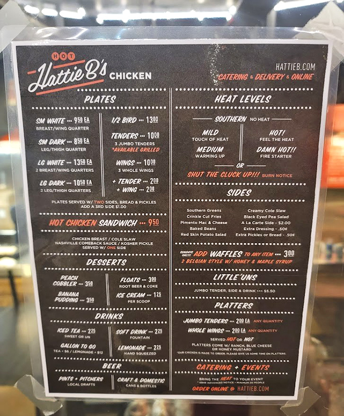 The menu board&mdash;a roadmap to pleasure or pain depending on your heat tolerance. Choose wisely, brave chicken adventurer.