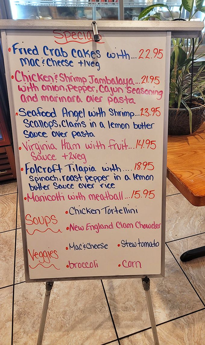 A handwritten specials board that reads like a love letter to comfort food. Seafood angel hair pasta? Yes, please!