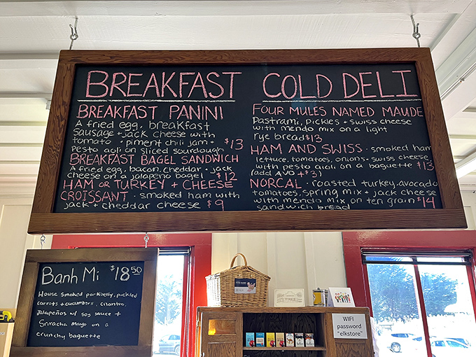 That chalkboard menu reads like poetry for hungry souls seeking the perfect bagel sandwich experience.
