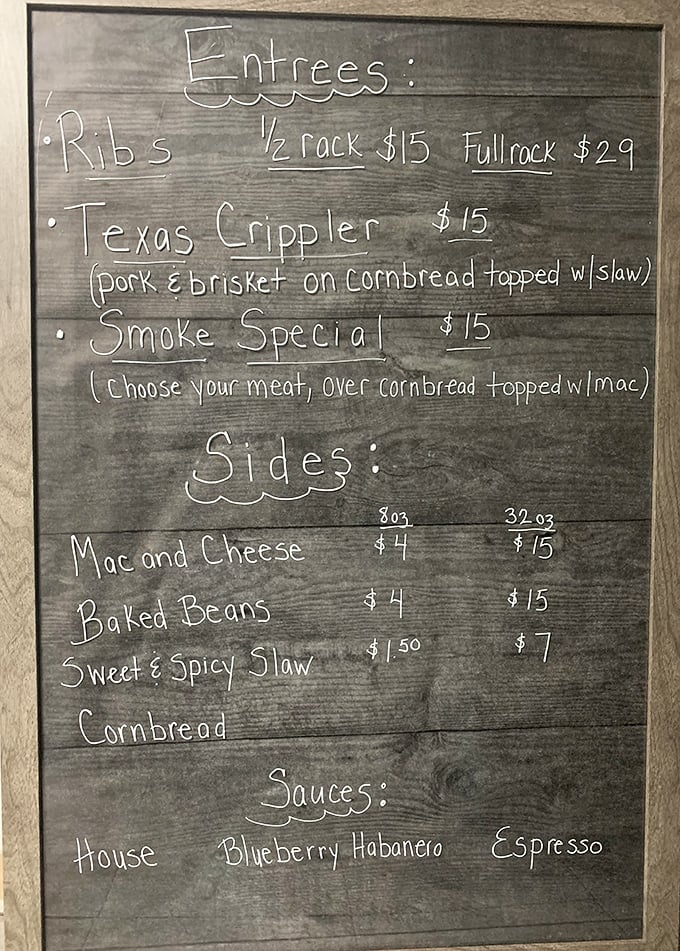 The chalkboard menu speaks volumes: no fancy fonts needed when your Texas Crippler and Smoke Special do all the talking. 
