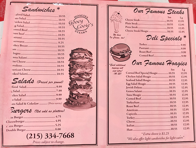 This pink menu tells the whole story: honest food at honest prices. No fancy descriptions needed when the sandwiches speak for themselves.