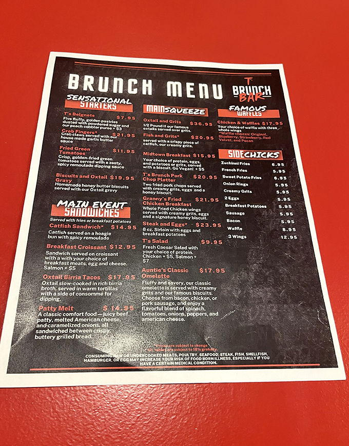 The menu reads like a love letter to comfort food—oxtail and grits, chicken and waffles, and that legendary salmon all vying for your attention.