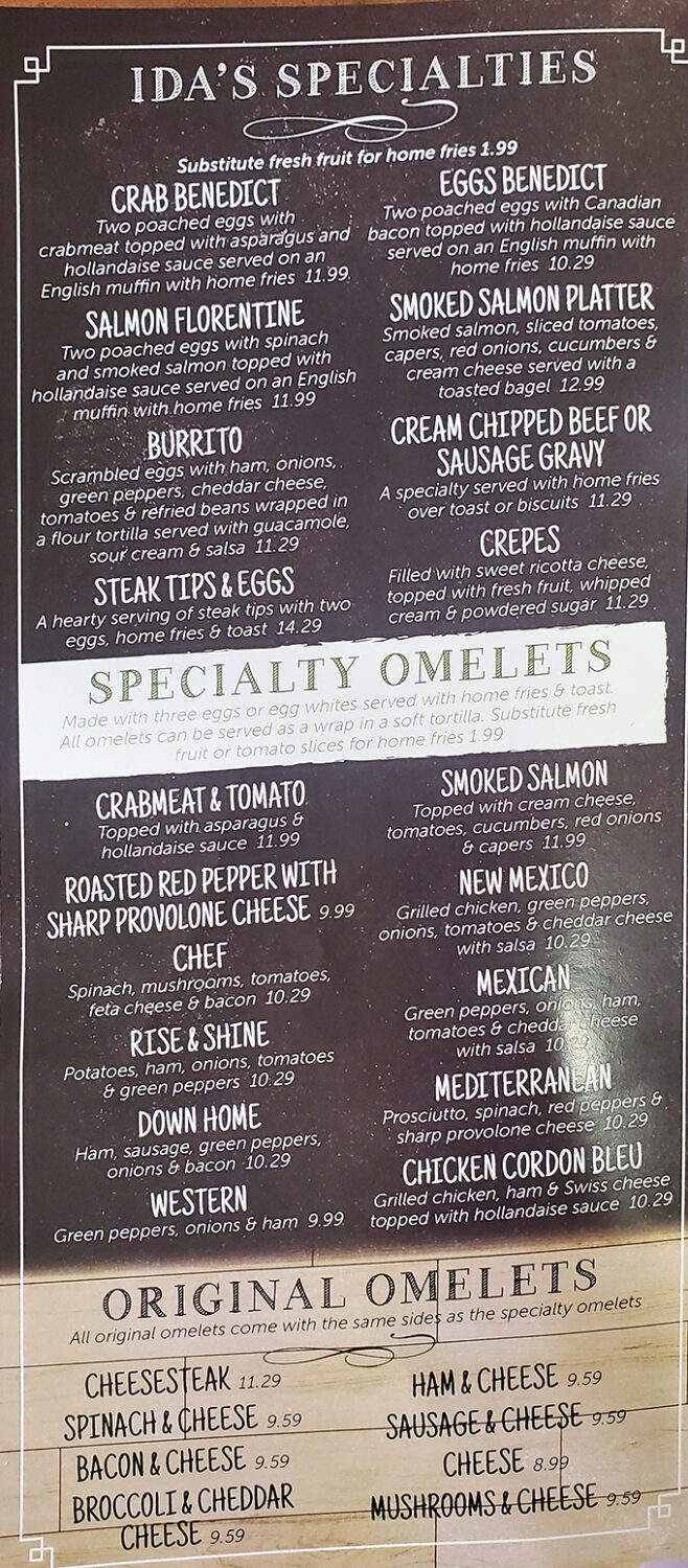 The chalkboard menu reads like a love letter to breakfast classics, each under $12&mdash;proof that affordable luxury still exists in America.