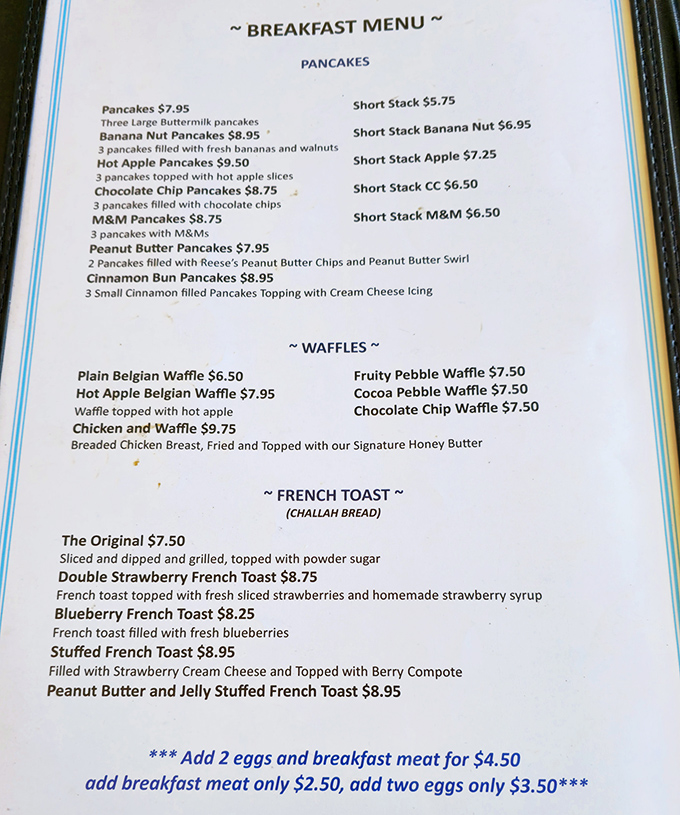 A menu that reads like a love letter to breakfast classics. Those cinnamon bun pancakes aren't just food; they're edible nostalgia.