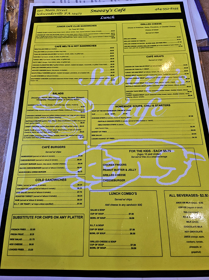 The yellow menu reads like a love letter to comfort food classics. No molecular gastronomy here, just the promise of dishes that understand exactly what you want.