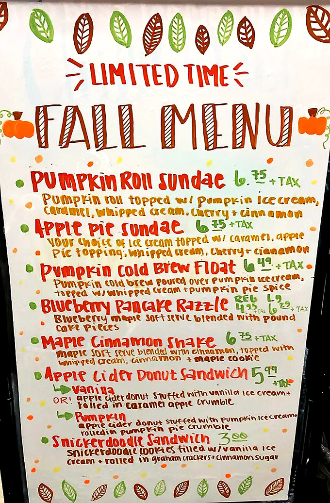 The handwritten fall menu board showcases seasonal creativity with treats like Pumpkin Roll Sundaes and Apple Cider Donut Sandwiches that scream "autumn in Pennsylvania."