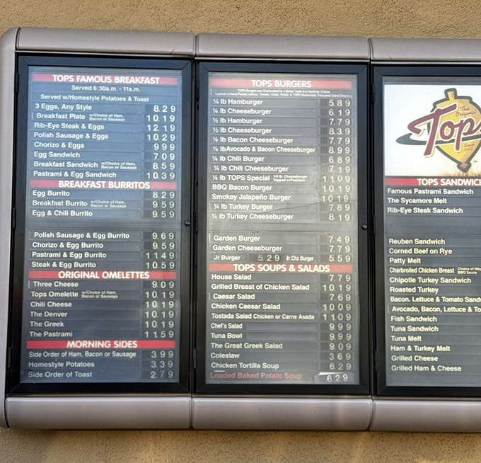 The menu board &ndash; a sacred text for regulars who've memorized it anyway but still scan it like they're seeing possibilities for the first time.