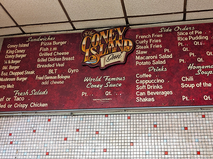 The menu board tells a story of American diner classics. That "World Famous Coney Sauce" isn't just marketing—it's a promise kept with every order.