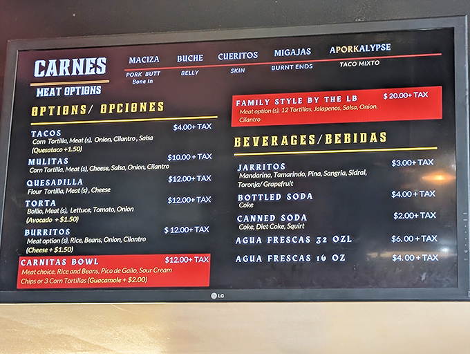 The menu board speaks the universal language of carnitas. Five different cuts of pork? That's not a menu&mdash;that's a love letter.
