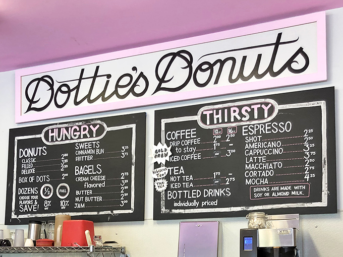 The artfully chalked menu board offers combo deals that feel like stealing. When pastries look this good, even the prices deserve artistic presentation.