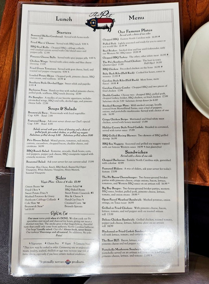 The menu reads like a love letter to Carolina barbecue traditions. Each description promises a journey through smoke, spice, and Southern hospitality.