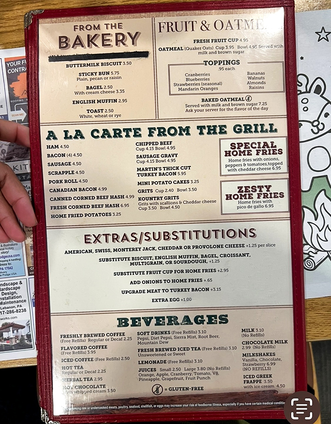 A menu that reads like a love letter to comfort food classics, where breakfast is an all-day affair and every side dish deserves attention.