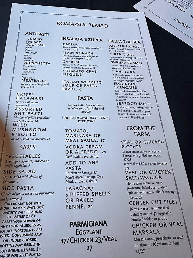 A menu that reads like a love letter to Italian cuisine, where every dish has earned its place through generations of perfection.