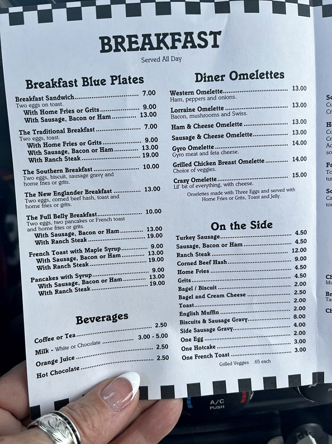 The breakfast menu reads like a love letter to morning indulgence, with options ranging from simple egg plates to the legendary biscuits and gravy that locals set their alarms for.