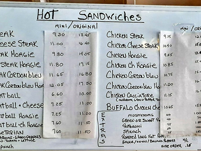 The handwritten menu board tells you everything you need to know &ndash; this place prioritizes feeding you well over fancy typography.