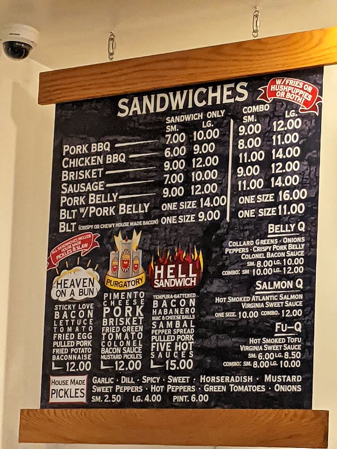 The menu board reads like barbecue poetry&mdash;"Heaven on a Bun," "Purgatory," and "Hell Sandwich" offer a divine progression of flavor that's worth every calorie.