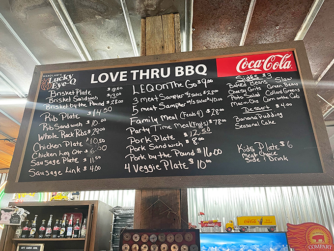 The chalkboard menu speaks the universal language of smoked meat devotion. "Love Thru BBQ" isn't just a slogan &ndash; it's their mission statement.