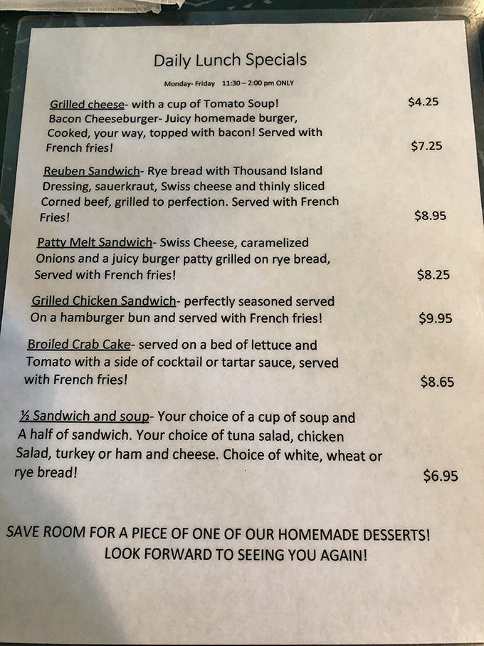 A menu that reads like a love letter to comfort food classics. That note at the bottom about saving room for dessert? Take it seriously.