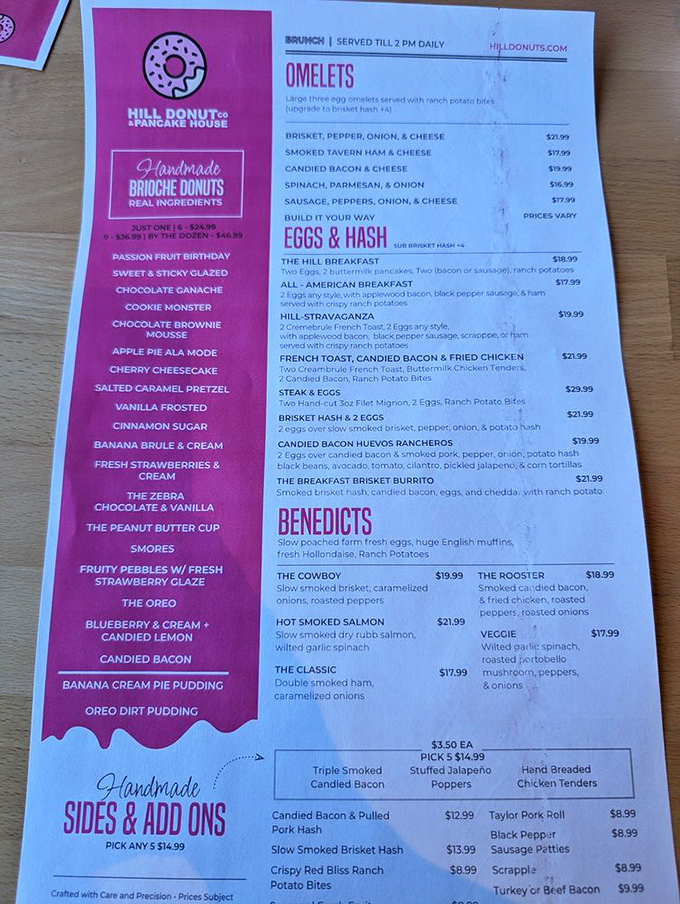 This menu isn't just a list&mdash;it's a roadmap to breakfast nirvana. One side tempts with handcrafted donuts, the other with savory creations that would make your cardiologist wince.