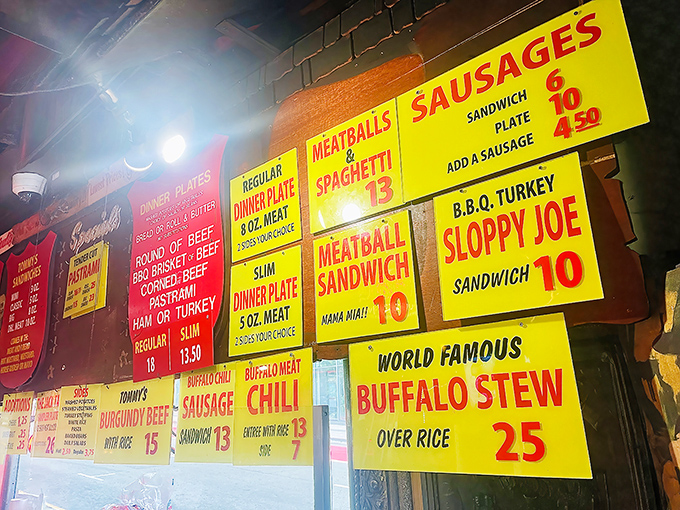 The menu board &ndash; a yellow and red masterpiece of culinary straightforwardness where "World Famous Buffalo Stew" isn't marketing hyperbole but a genuine promise.
