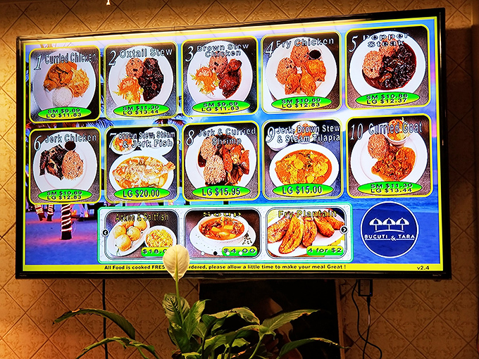 The digital menu board showcases a mouthwatering parade of Caribbean classics, each photo a preview of the flavor journey awaiting your taste buds.