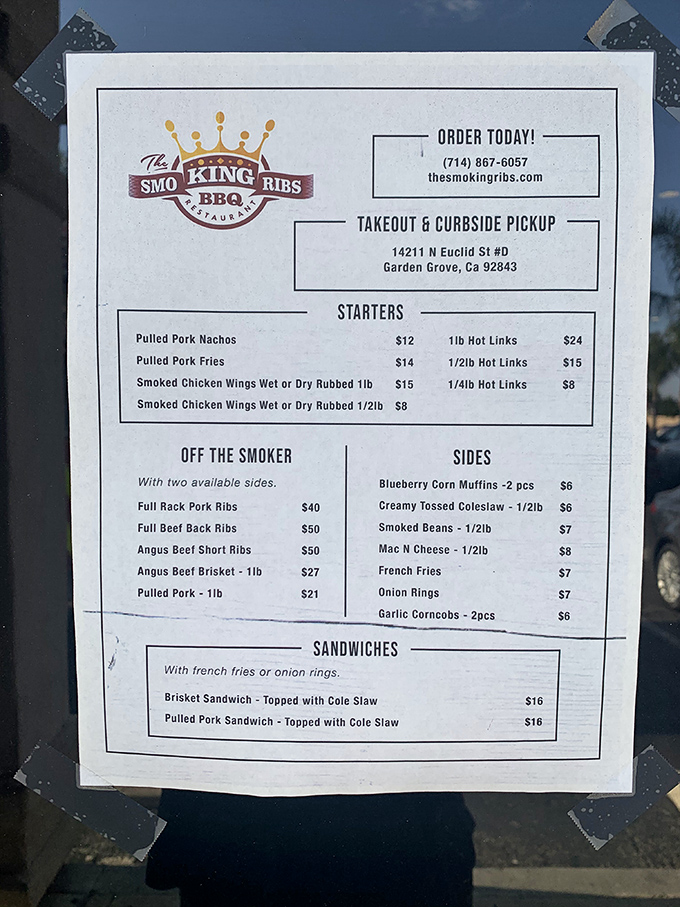 A menu that cuts right to the chase: meat, sides, and nothing you don't need. The blueberry corn muffins hint at unexpected delights amid classic BBQ fare.