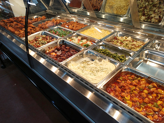 The hot food bar stretches out like a buffet designed by someone who really understands comfort.