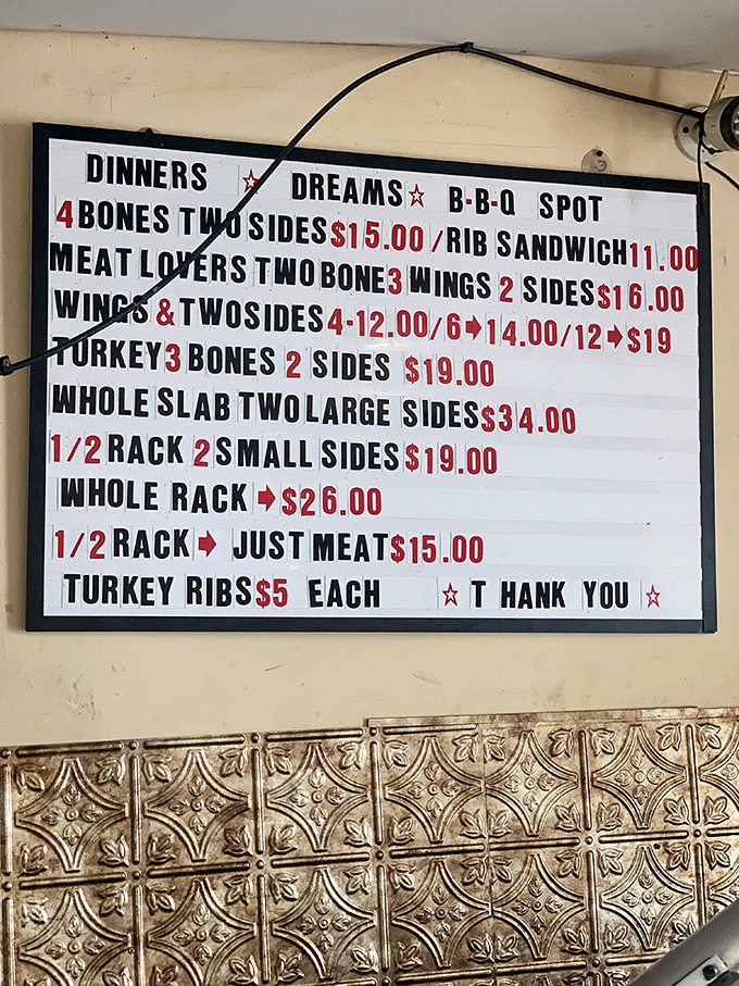 The menu board tells you everything you need to know: meat is the star, sides are the supporting cast, and your stomach is about to be very, very happy.