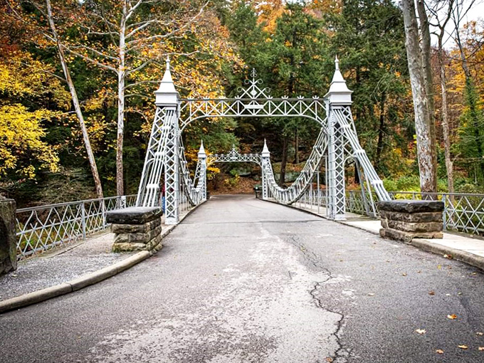 The Mill Creek Suspension Bridge welcomes visitors like a Victorian doorman who's been on the job since 1895 and still hasn't lost his elegant posture.