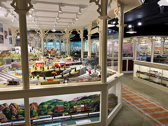 Miniature worlds unfold behind glass, where tiny conductors perpetually circle towns frozen in time, never late and always on track.