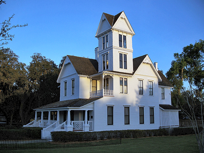 The Mote-Morris House stands like a Victorian time capsule, its white wooden frame and wraparound porch practically begging for a glass of sweet tea.