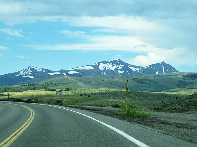 The road to retirement bliss often includes mountain views like these, where nature's majesty becomes your daily screensaver.