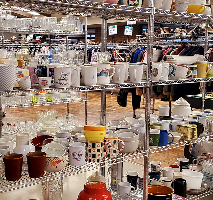 A ceramic army stands at attention - hundreds of mugs waiting to tell their tales over your morning coffee.