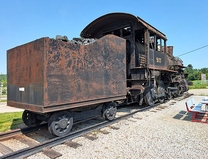 History meets whimsy at this site, where a vintage locomotive shares space with the towering bobblehead chef.