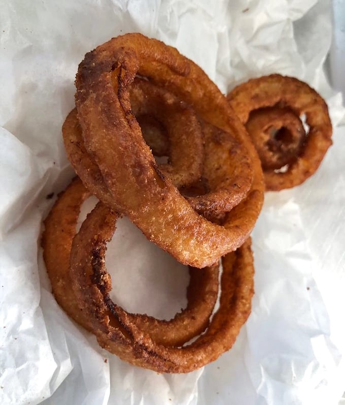 Golden halos of happiness. These aren't just onion rings&mdash;they're crispy, hand-battered treasures that people cross county lines to devour.