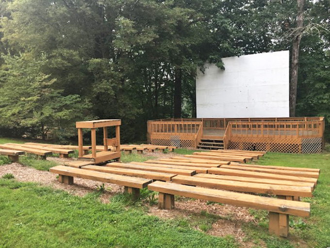 Movies under the stars, anyone? This rustic amphitheater proves entertainment existed before Netflix, and sometimes the forest makes the best backdrop.