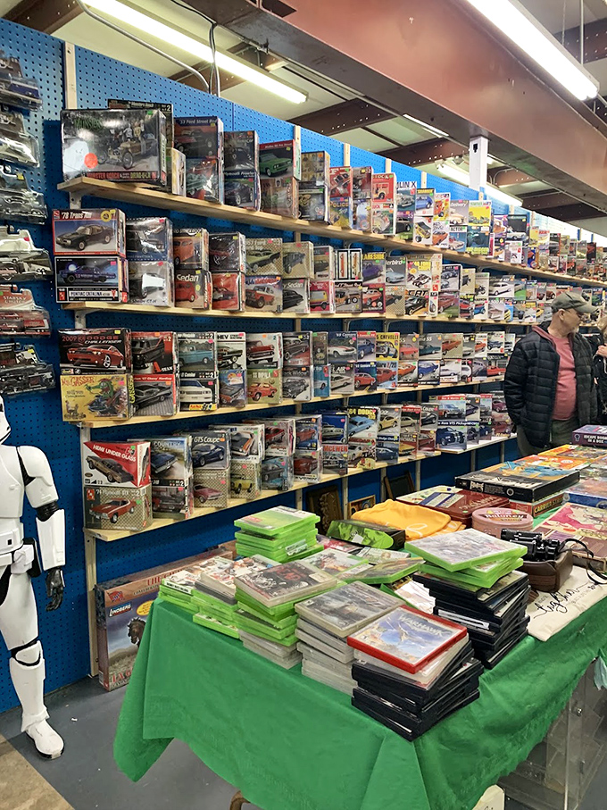 This collector's paradise could make grown men weep. Vintage model cars still in their original packaging line the walls like a time capsule of American automotive dreams. 