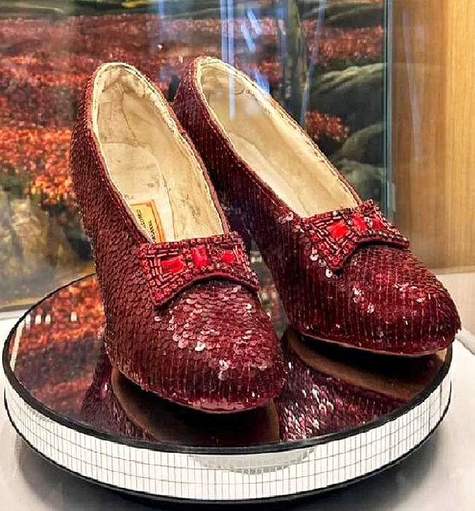 Not just any shoes – THE shoes. These ruby slippers capture that magical moment when fashion and fantasy perfectly collided.