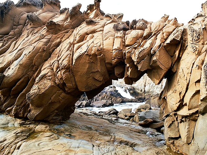 This natural sandstone arch proves that with enough time and patience, water can sculpt better than any artist with a chisel.
