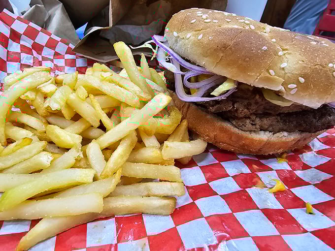 This isn't just a burger&mdash;it's edible architecture. The perfect stack of beef, bun, and fresh toppings that makes fast food chains weep with inadequacy.