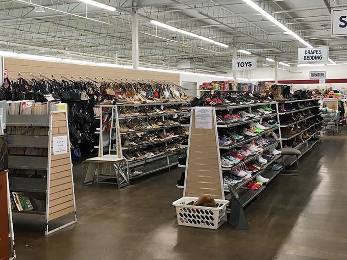 The shoe section stretches like a metropolitan skyline of footwear possibilities. Each pair holds stories and potential adventures waiting for new feet.