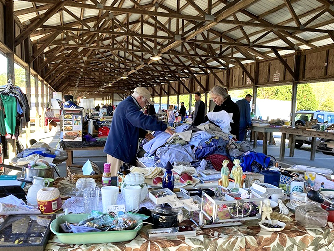 Serious shoppers in their natural habitat. Notice the focused concentration—like archaeologists who've just discovered the bargain equivalent of King Tut's tomb.